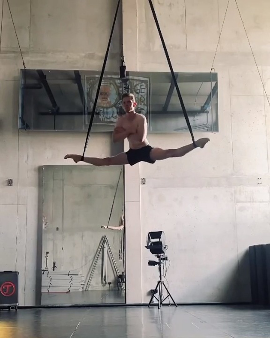 Acrobat Displays Incredible Strength And Flexibility While Training on ...
