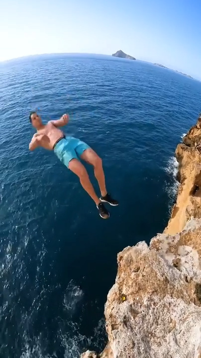 Guy Backflips Into Sea While Cliff Diving | Jukin Licensing