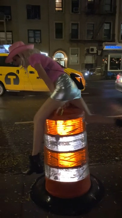 Woman Falls While Trying To Jump Over Construction Barrel on Sidewalk ...