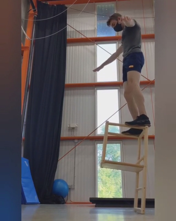 Circus Artist Balances on Inverted Acrobatic Chair | Jukin Licensing