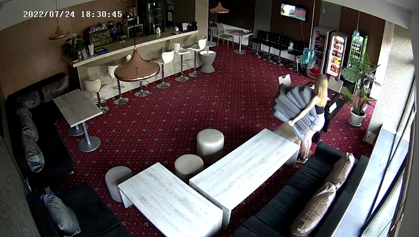 Woman Loses Footings and Falls Over Stool While Collecting Cushions ...