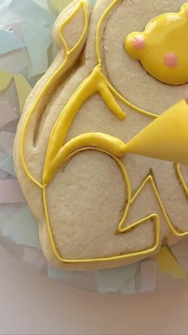 Person Decorates Lion Shaped Cookie | Jukin Licensing