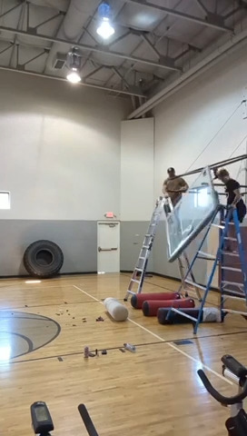 Guy Gets Hit by Basketball Hoop's Board and Falls Off His Step Ladder ...