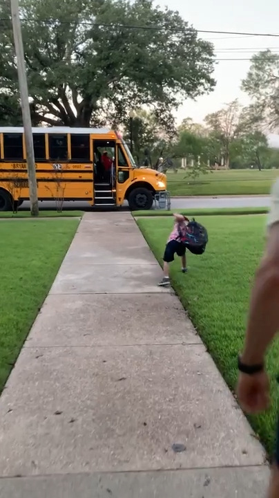 Little Boy Falls Onto Grass While Running to Catch School Bus | Jukin ...