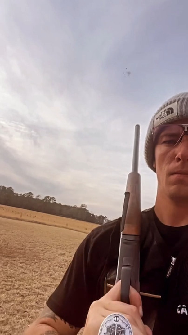 Guy Shoots Target While Aiming Through Selfie Mode on Phone | Jukin ...