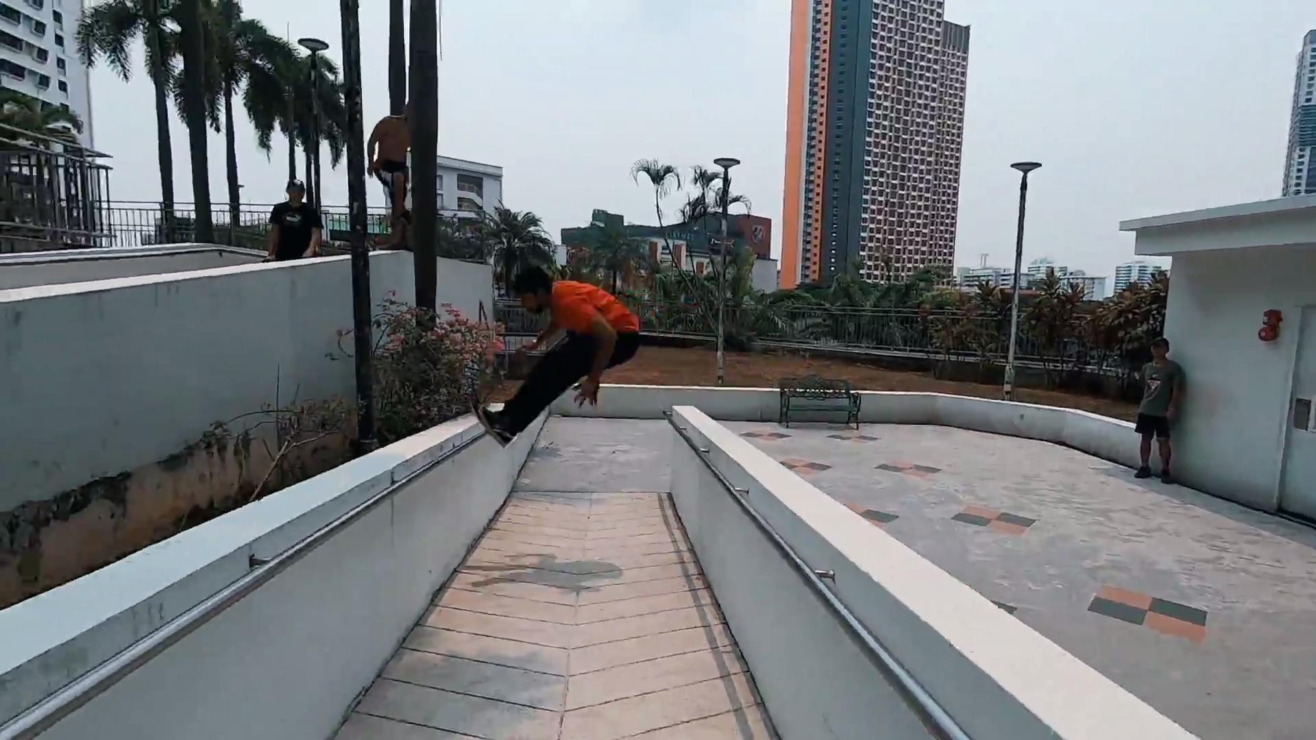 Guy Performs Free Running Tricks in Building Complex | Jukin Licensing