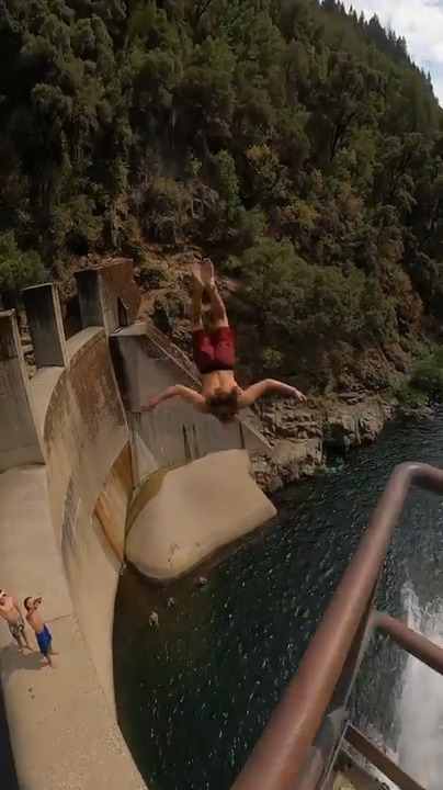 Guy Jumps off 100 Feet Dam Into River Below | Jukin Licensing