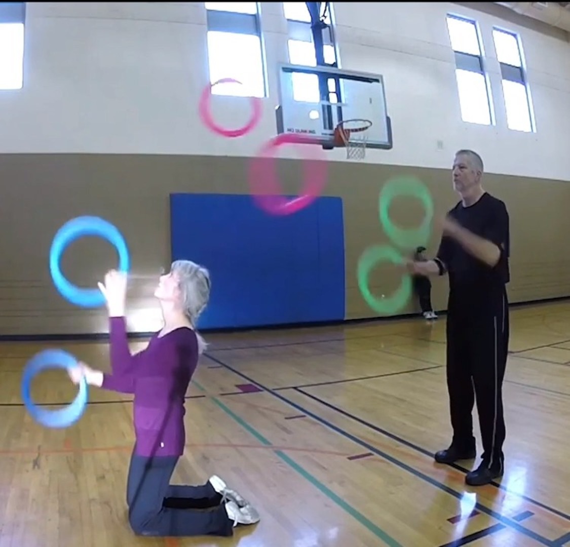 Duo of Jugglers Pass Rings to Each Other While Juggling Them | Jukin ...