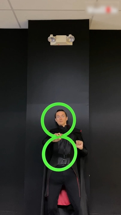 Man in Popular Film Costume Performs Impressive Floating Ring Tricks ...