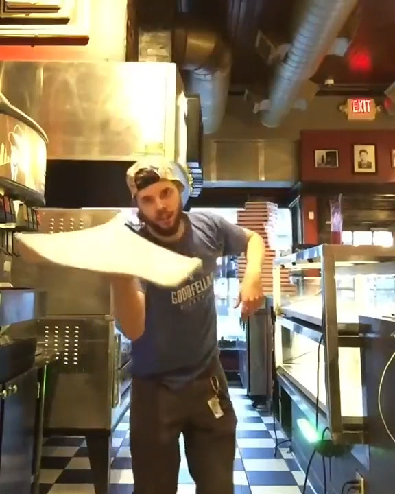 Guy Shows off Impressive Pizza Dough Throwing Skills | Jukin Licensing