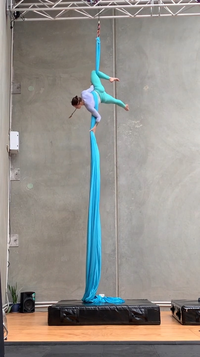 Circus Artist Performs Incredible Aerial Silk Tricks | Jukin Licensing