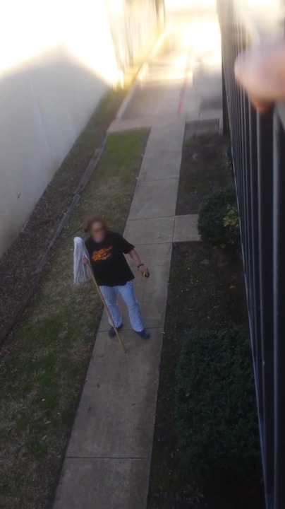 Neighbors Fight with Brooms | Jukin Licensing