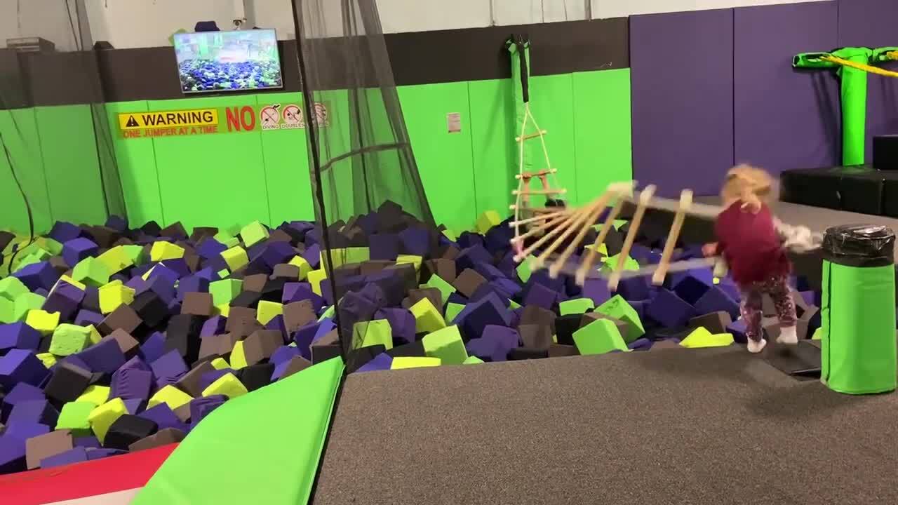 Toddler Falls on Ground After Being Accidentally Hit in Trampoline Park ...