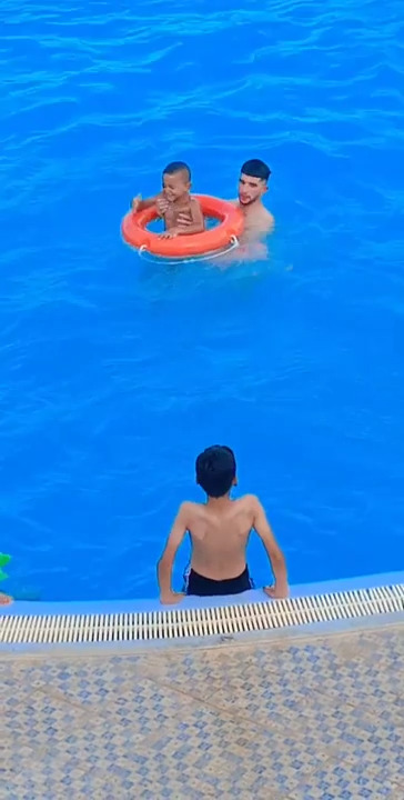 Man Resting by the Pool Heroically Saves Little Boy From Drowning ...