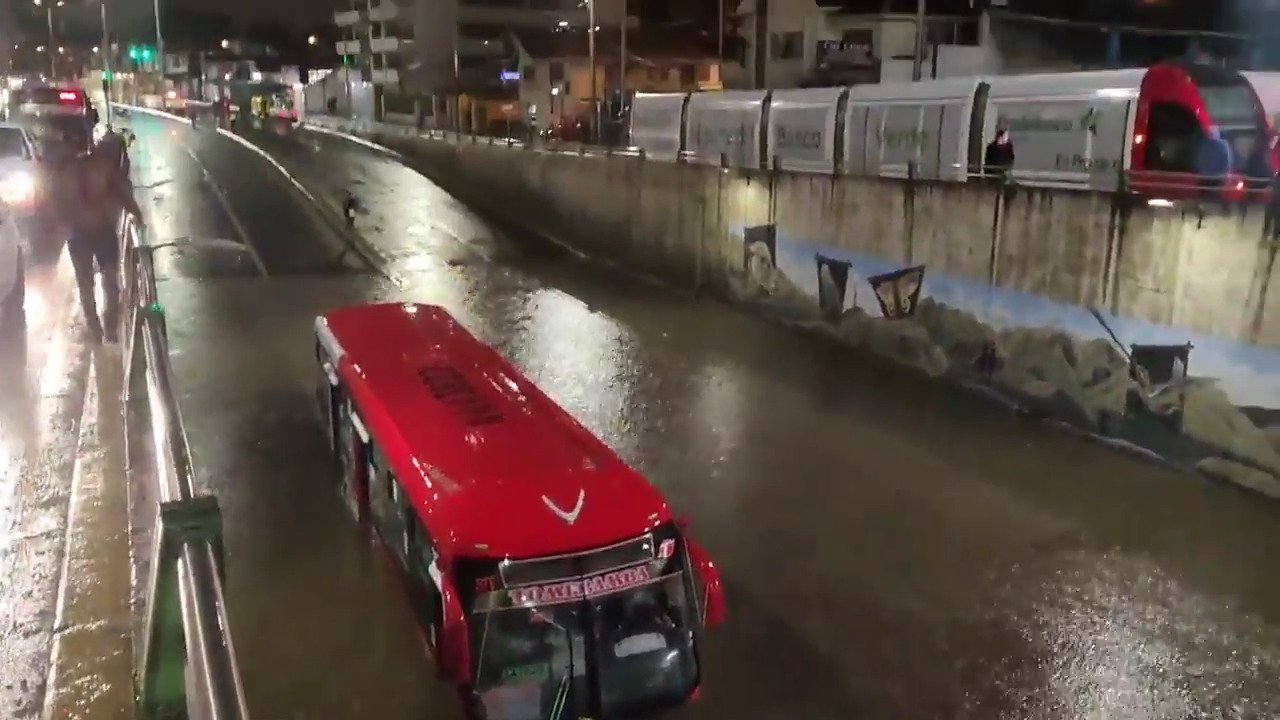 Partially Submerged Bus Gets Stuck on Flooded Road | Jukin Licensing
