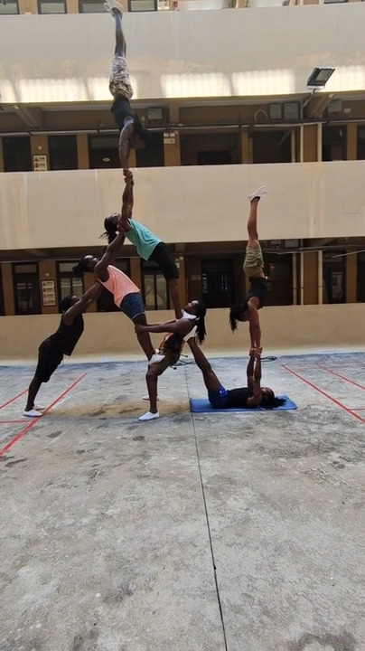 Acrobats Form Human Pyramid to Practice for Show | Jukin Licensing