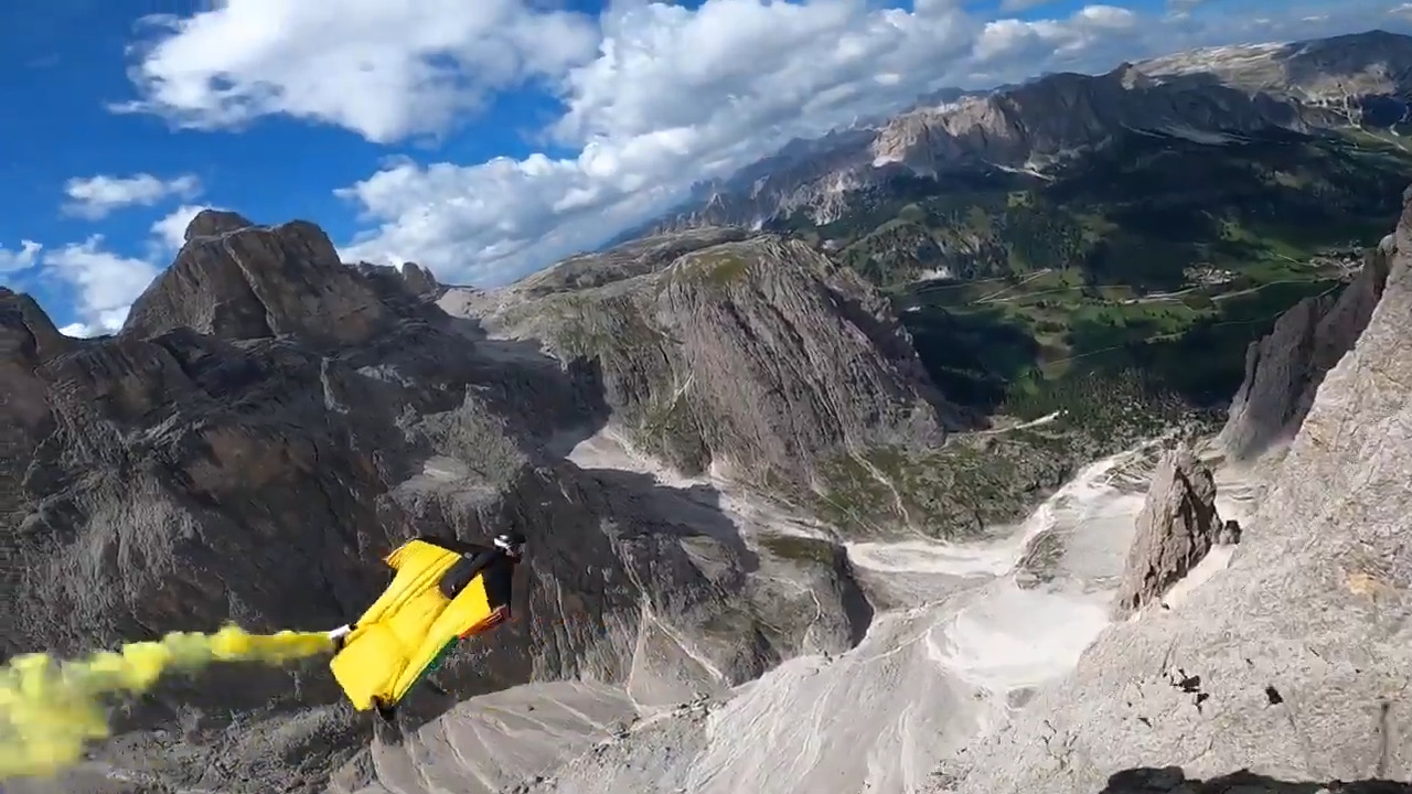 Guy Does BASE Jumping Off Cliff in Italy | Jukin Licensing