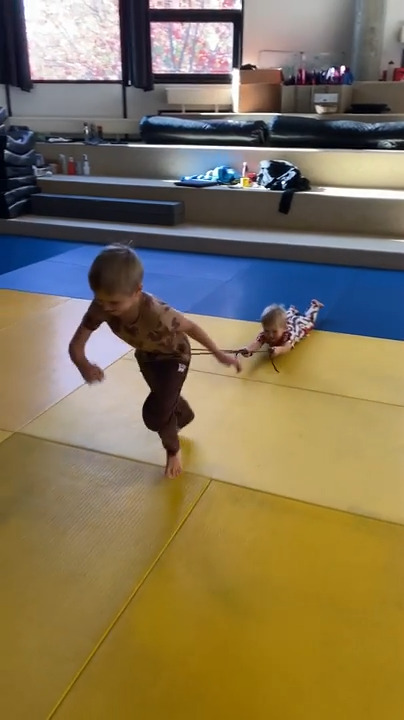 Younger Brother Holds Rope And Gets Dragged Behind Kid While he Runs ...