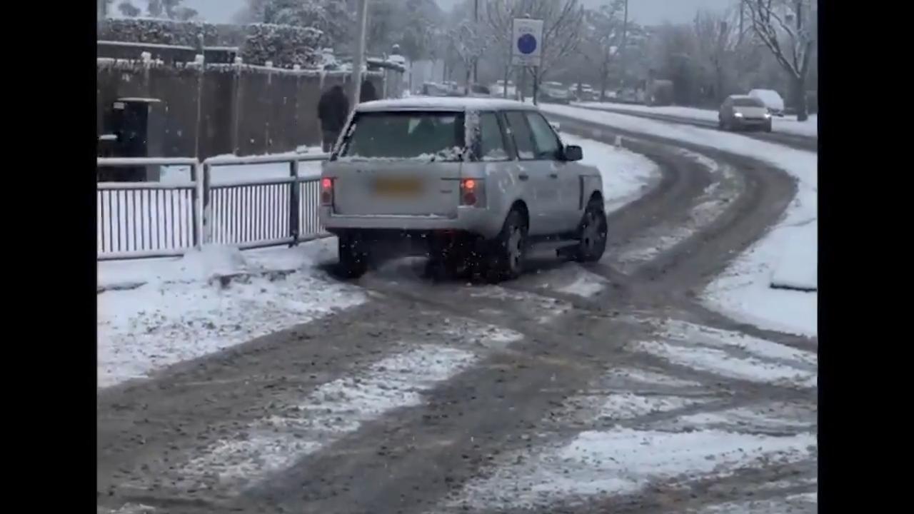 Cars Lose Control and Crash Into Fence After Slipping on Icy Road ...