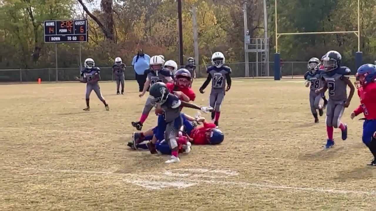 Kid Scores Incredible Touchdown Despite Losing Shoe | Jukin Licensing