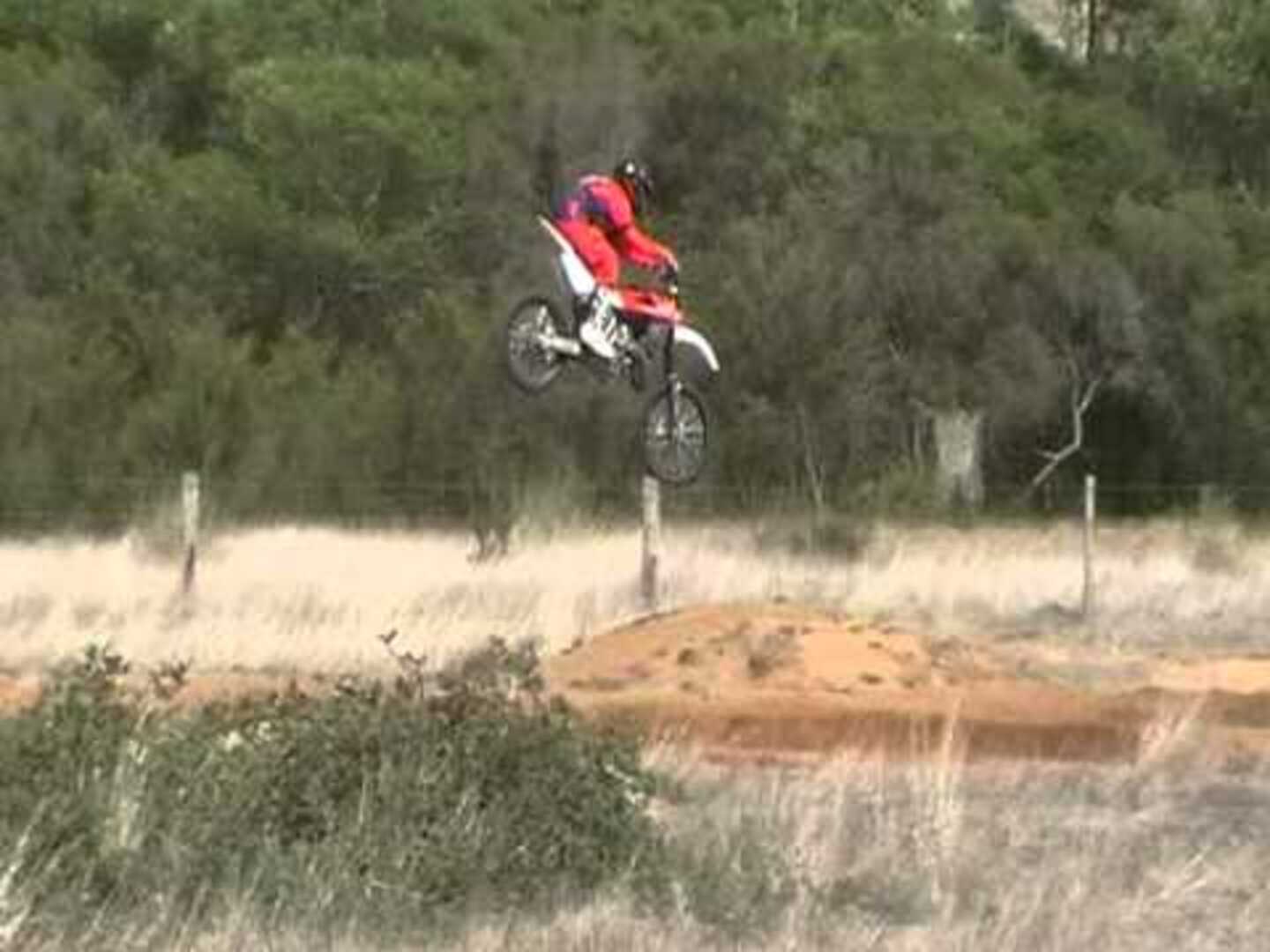 Guy Riding Motorbike Falls While Jumping Over Dirt Ramps | Jukin Licensing