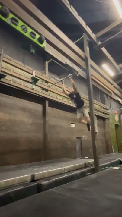 Guy Makes 15 Foot Jump From One Horizontal Bar to Another | Jukin Licensing