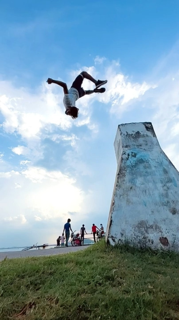 Guy Executes Smooth Backflip Off of Tall Platform | Jukin Licensing