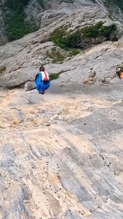Daredevil Performs Summersaults While Base Jumping With Wingsuit ...