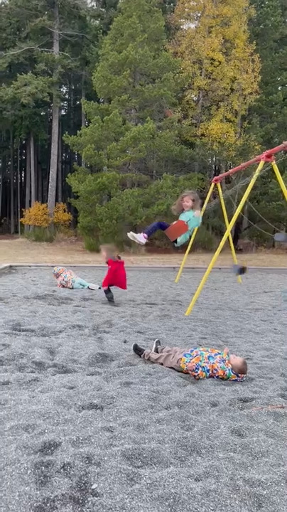 Kids Jump Off Swing Set Playfully | Jukin Licensing