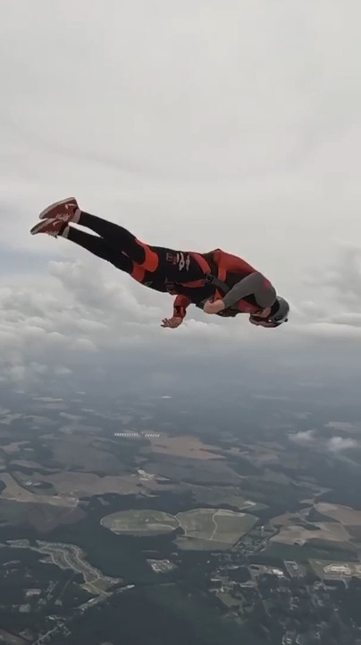 Person Shows Amazing Spins While Demonstrating Freestyle Skydiving ...