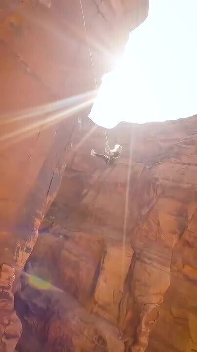 Woman Does Canyon Jump While Being Secured With Harness | Jukin Licensing