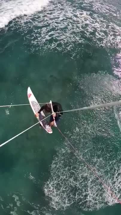 Parasurfer Spins Their Board 360 Degrees While Surfing | Jukin Licensing