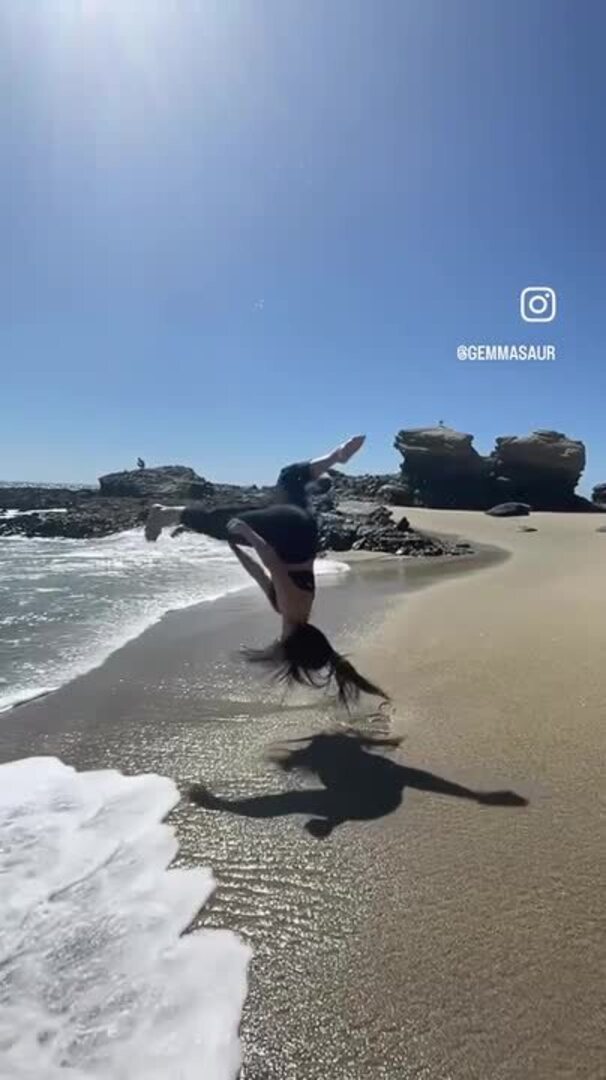 Woman Does Mix of Different Flips and Tricks on Beach | Jukin Licensing