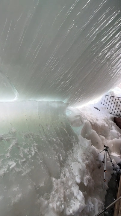 Large Slab of Ice Blocks Front of House | Jukin Licensing