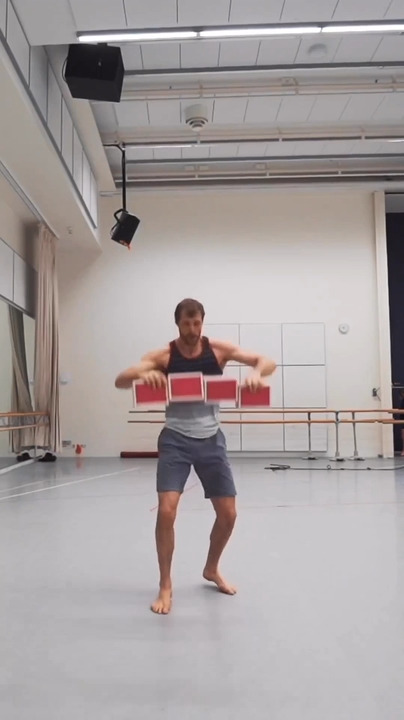 Cigar Box Juggler Practices for Show by Juggling Several Cigar Boxes At ...