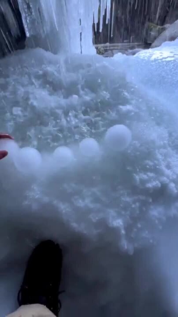 Person Witnesses Strange Phenomenon While Exploring Frozen Waterfall ...