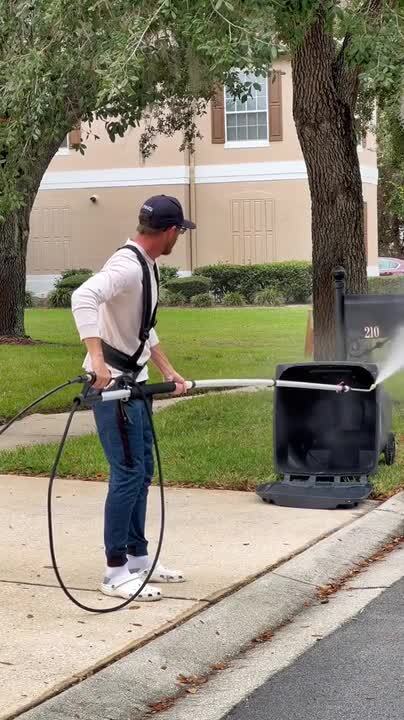 Guy Shows How to Pressure Wash Garbage Bin | Jukin Licensing