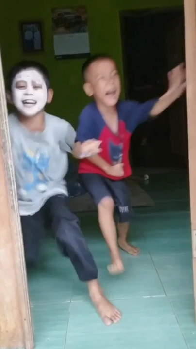 Kid Crashes Into Door During Playtime With Fellow | Jukin Licensing