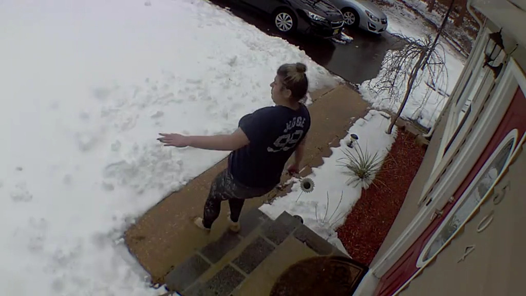 Woman Loses Footing and Falls While Stepping Out of House | Jukin Licensing