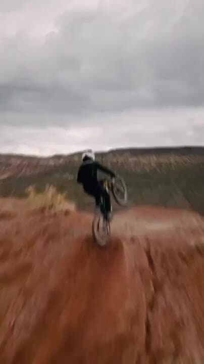 Guy Performs High Jump Off Cliff With Mountain Bike | Jukin Licensing