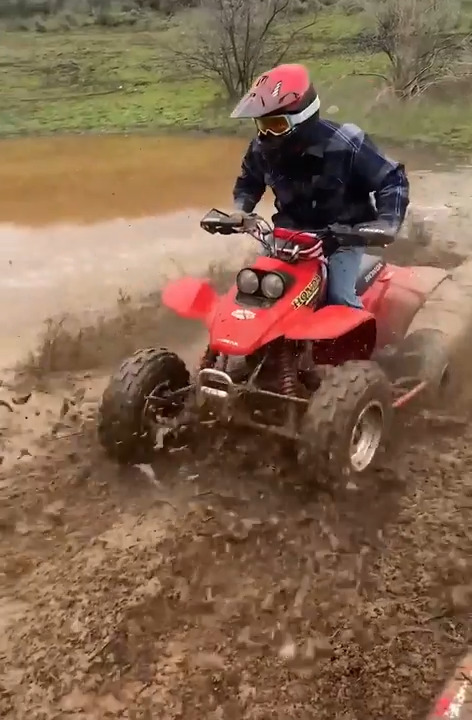 Guy Riding ATV Falls Into Puddle While Attempting Drift | Jukin Licensing