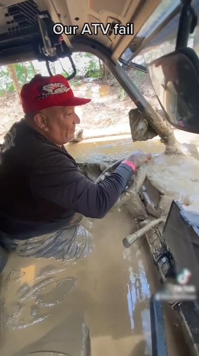 Couple Gets Stuck in Mud Pit While Strolling in Their ATV | Jukin Licensing