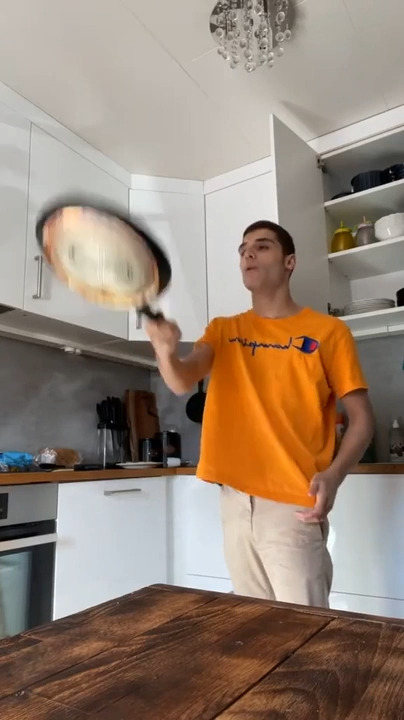 Guy Bangs Head Into Cupboard While Flipping Pancake | Jukin Licensing