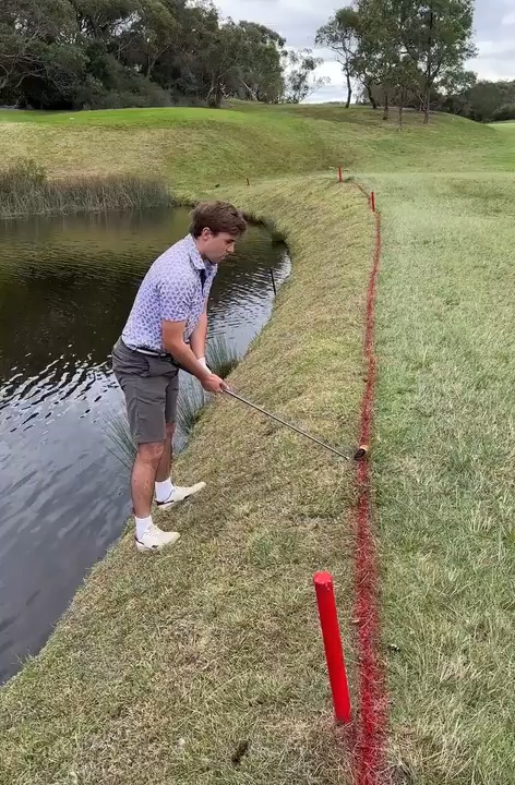 Man Attempting Tricky Golf Shot Falls Into Water | Jukin Licensing