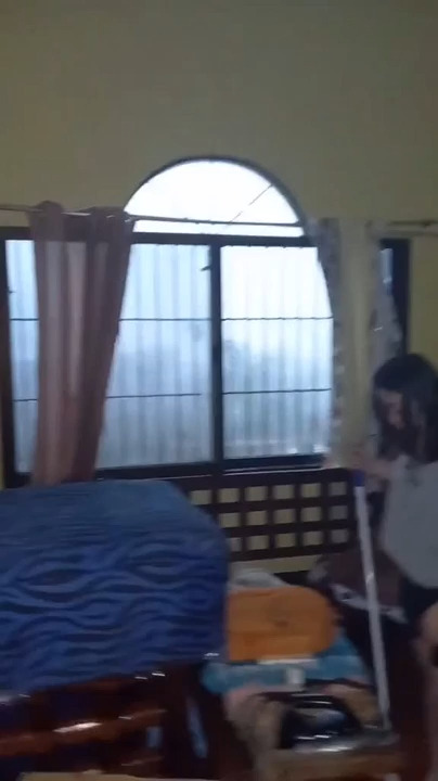 People Run for Cover During Typhoon as Strong Winds Break Glass Window ...