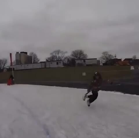 Person Tumbles and Faceplants on Ice Skating Rink | Jukin Licensing