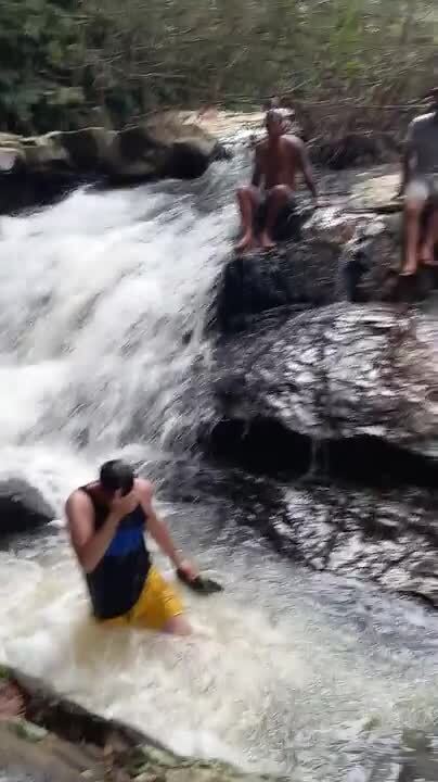 Man Loses Balance and Tumbles While Standing in Waterfall | Jukin Licensing