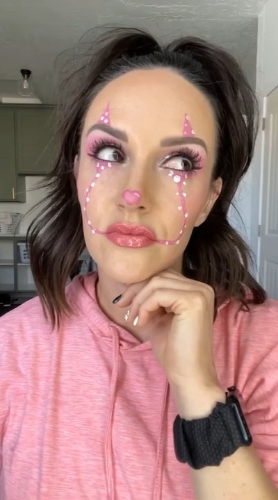 Woman Demonstrates Steps to do Minimal Clown Makeup for Halloween ...