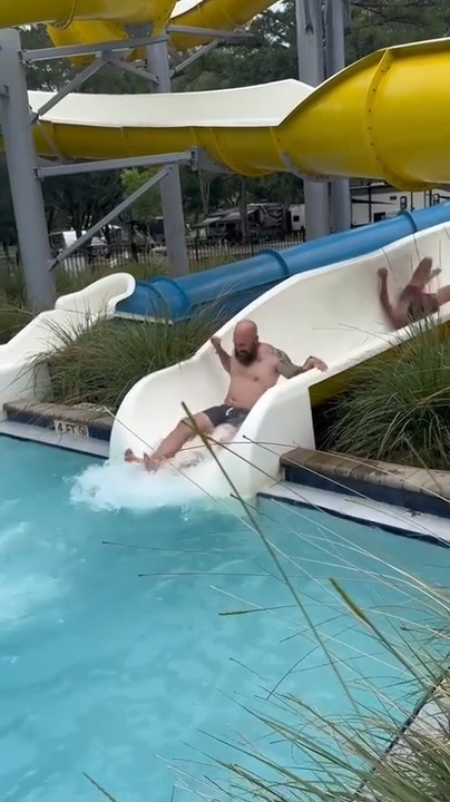 Guy on Water Slide Gets Hit From Behind By Another Person | Jukin Licensing