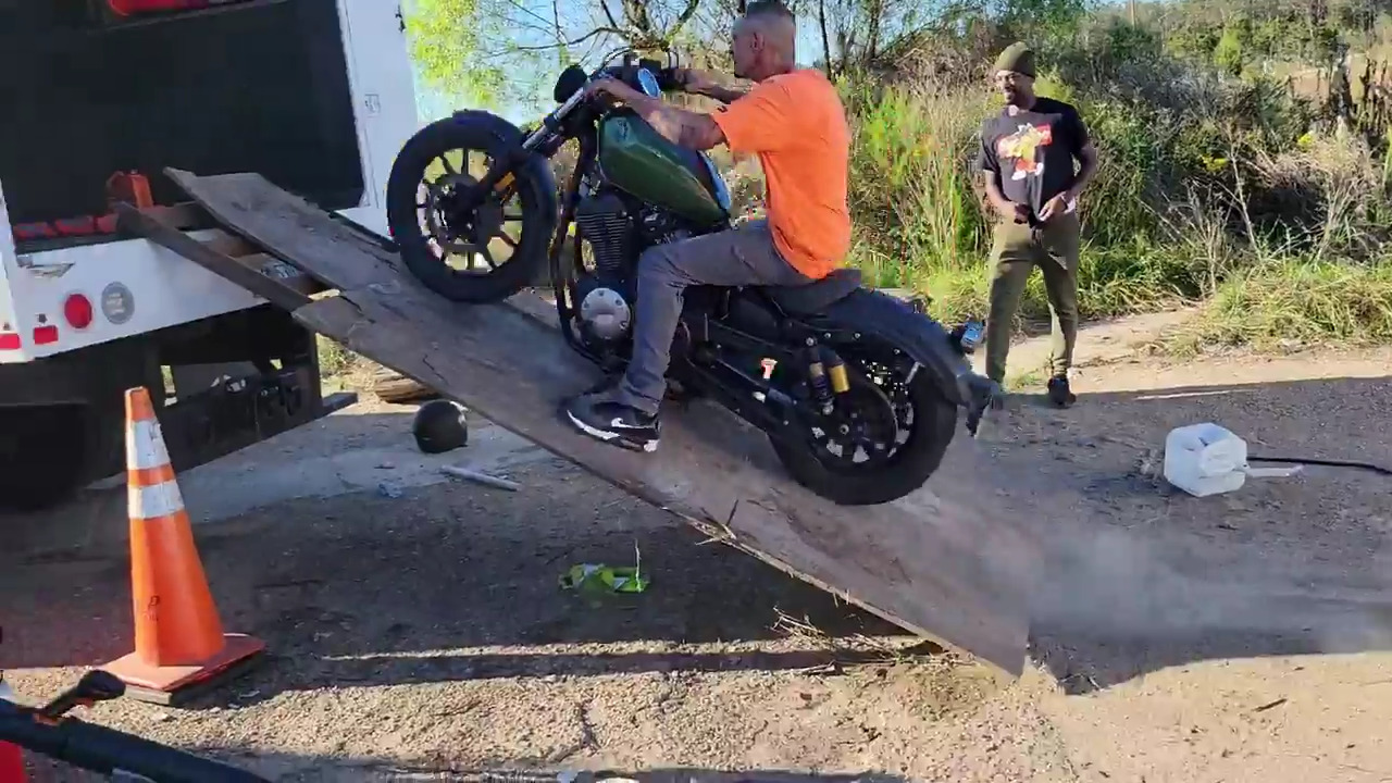 Man Riding Motorcycle on Incline Falls Back | Jukin Licensing